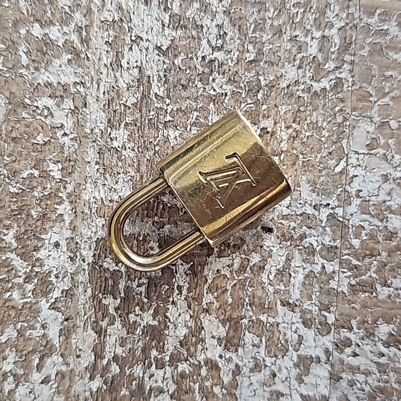 Louis Vuitton | Bags | Louis Vuitton Lock | Poshmark